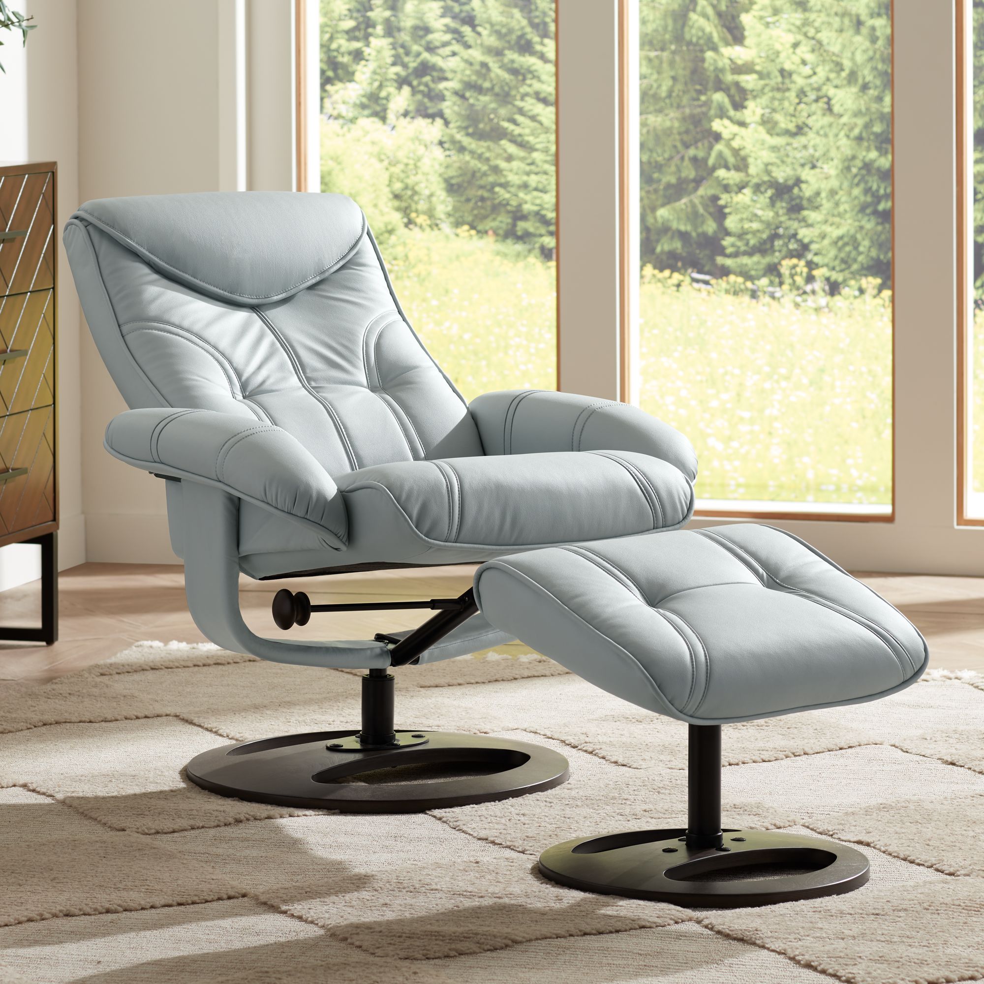 Newport Sky Blue Faux Leather Swivel Recliner and Slanted Ottoman ...